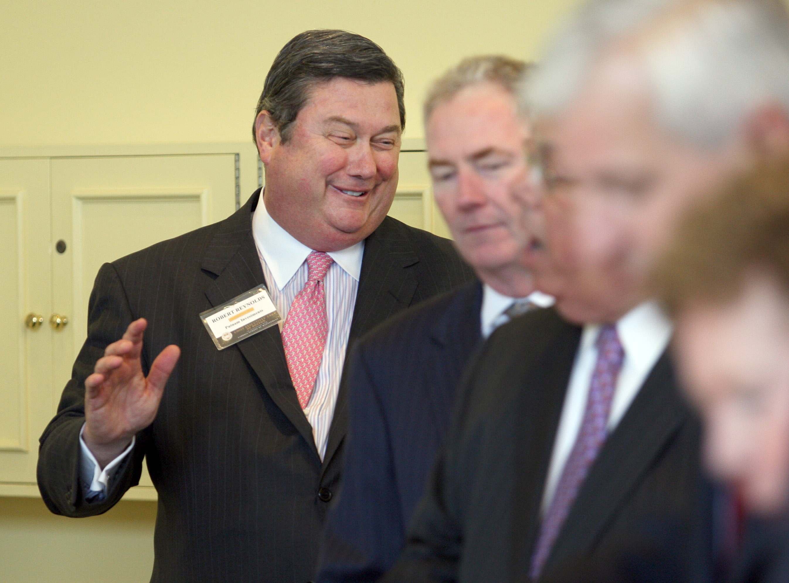 Putnam cuts 115 jobs as index funds take a toll on Boston investment ...