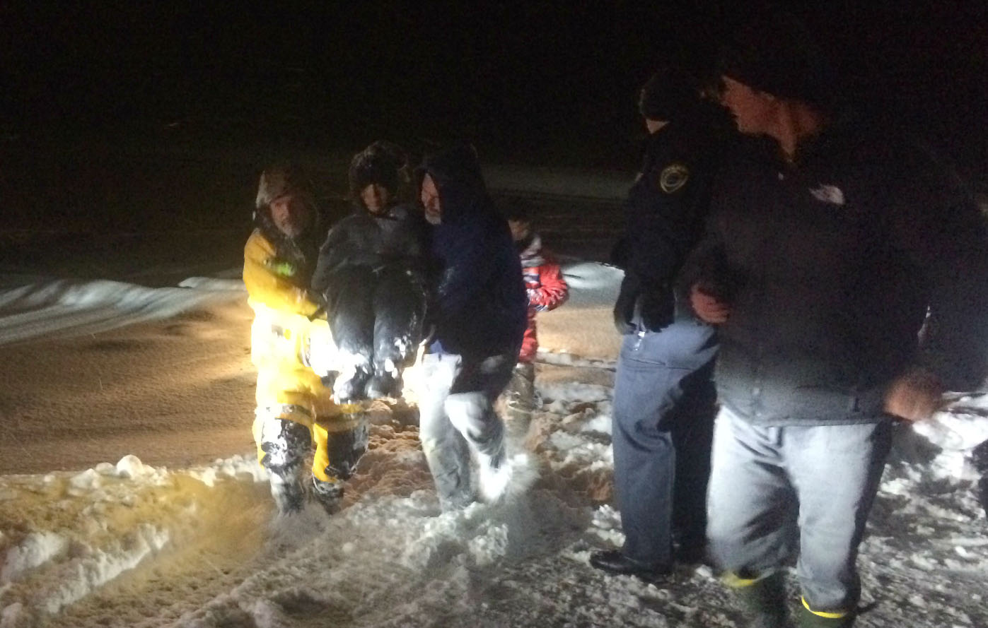 Maine father, 2 children rescued after snowmobile falls through ice on ...